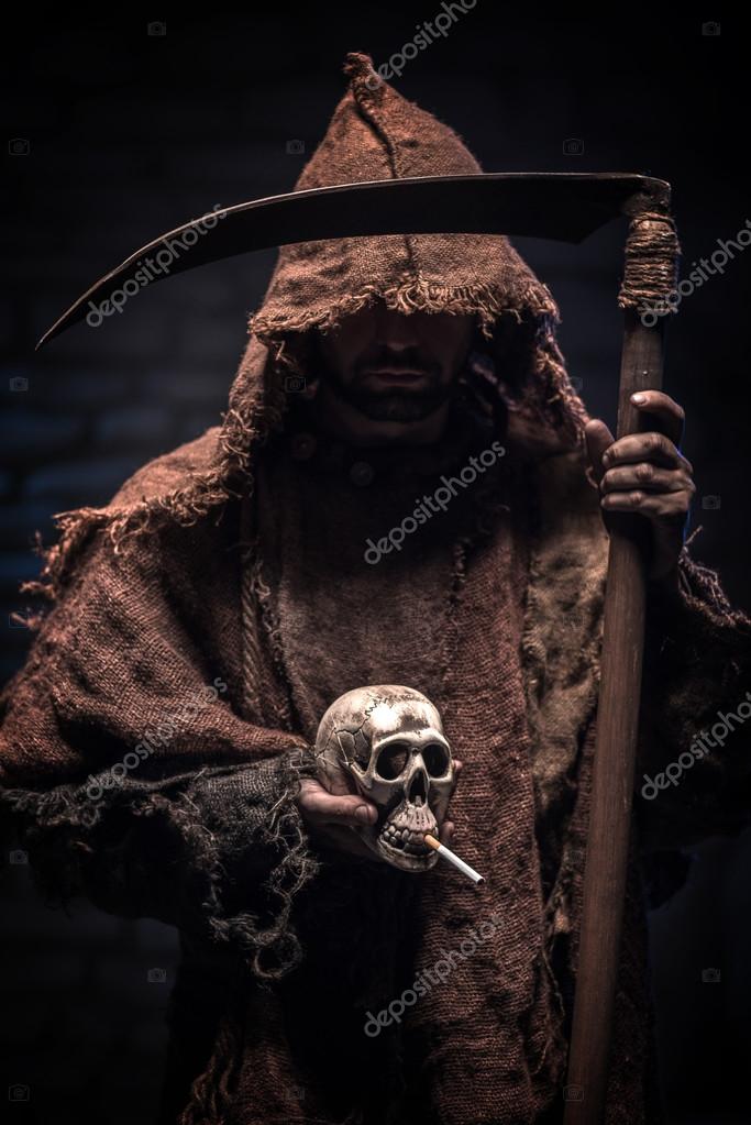 Dreadful death character proposes you to smoke — Stock Photo ...