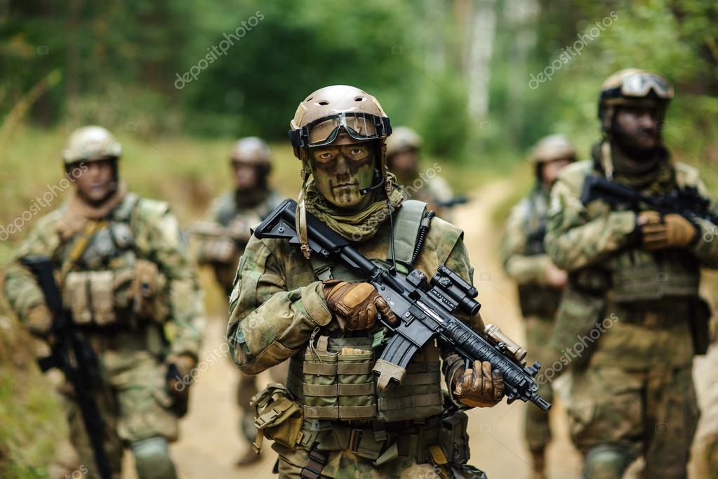 Soldiers standing with arms and looks back — Stock Photo © kaninstudio ...