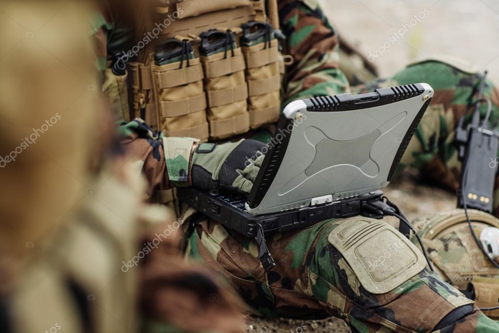 Ranger using laptop outdoors — Stock Photo © kaninstudio #86246548