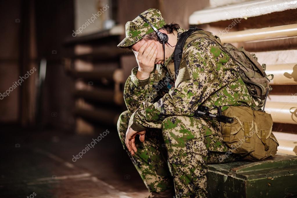 Sad Solider Sitting Rifle Stock Photo by ©kaninstudio 97946488