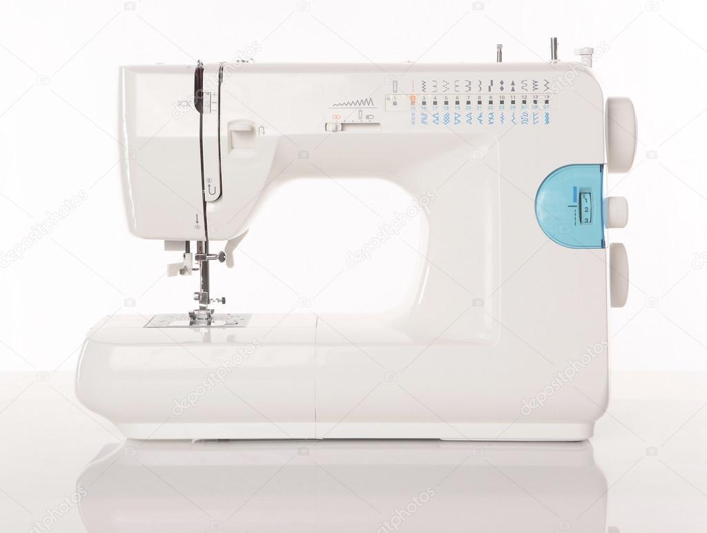 Modern sewing machine Stock Photo by ©Redav 64592499