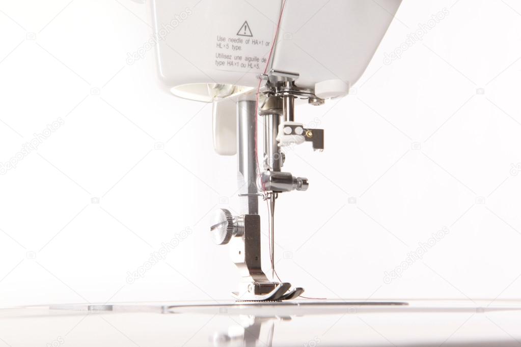 Modern sewing machine Stock Photo by ©Redav 64595367