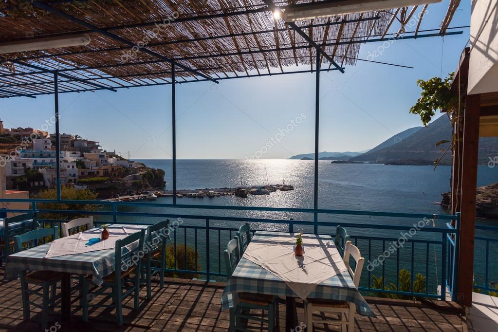 Bali, Island Crete, Greece, - June 23, 2016: The tables in the ...