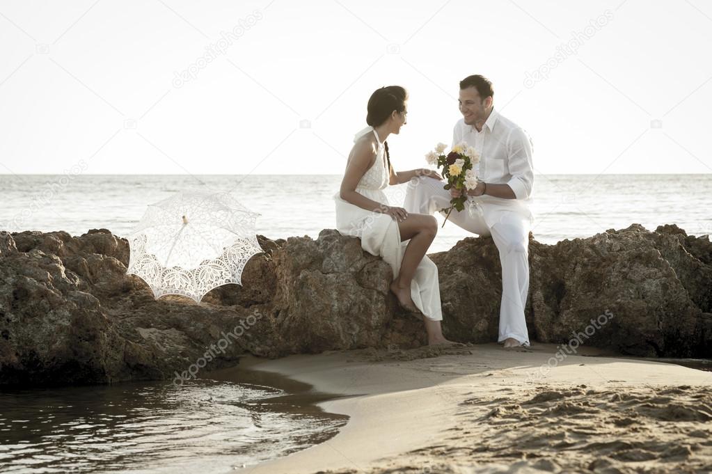 Romantic Couple at ocean Stock Photo by ©geoffgoldswain 121524744