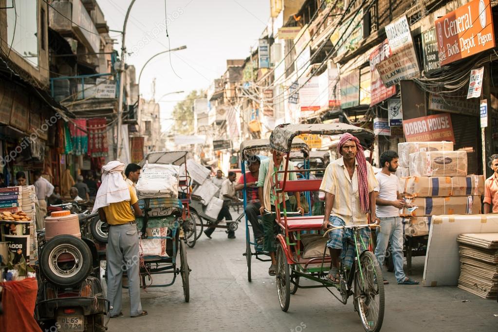 Cycle rickshaw riding the vehicle on the street of Old Delhi, India ...