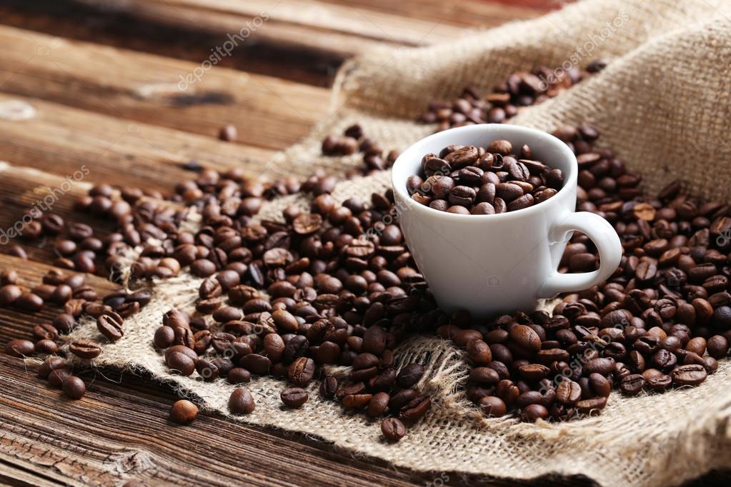 Coffee beans in cup — Stock Photo © 5seconds #90829600