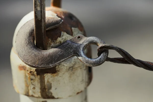 Vintage hook with metal cable. Connection concept. macro view. shallow ...