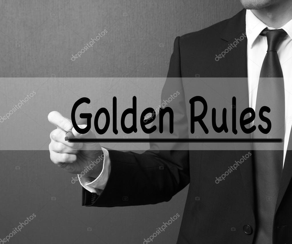 Business man writing - Golden Rules — Stock Photo © tumsasedgars #119753814