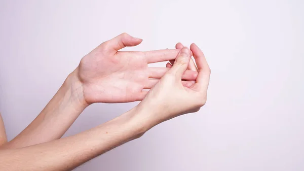 Parkinson's disease symptoms. Close up of tremor (shaking) hands of ...