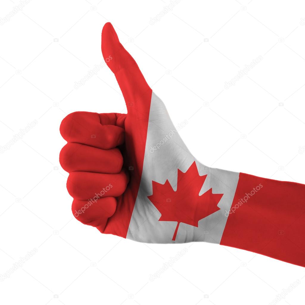 Canada flag painted hand showing thumbs up sign on isolated white ...