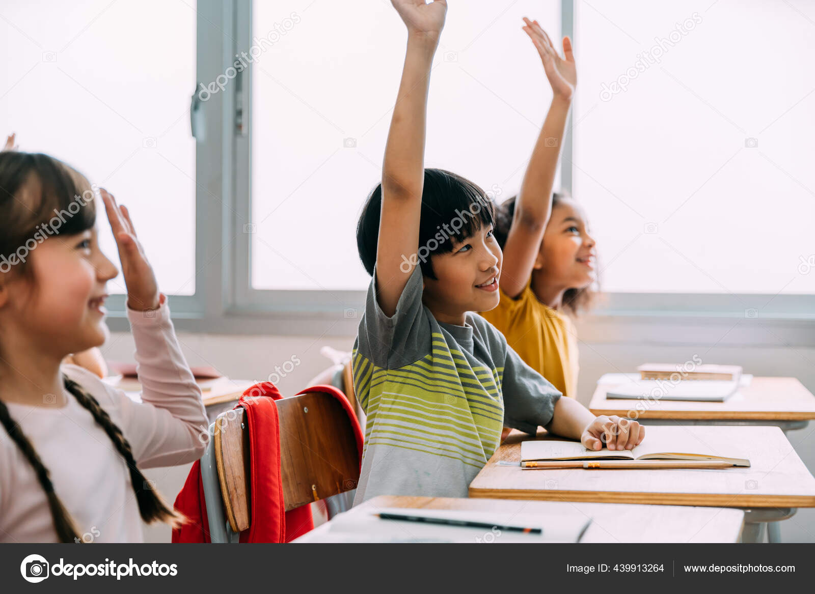 Hands Raised Up In Class