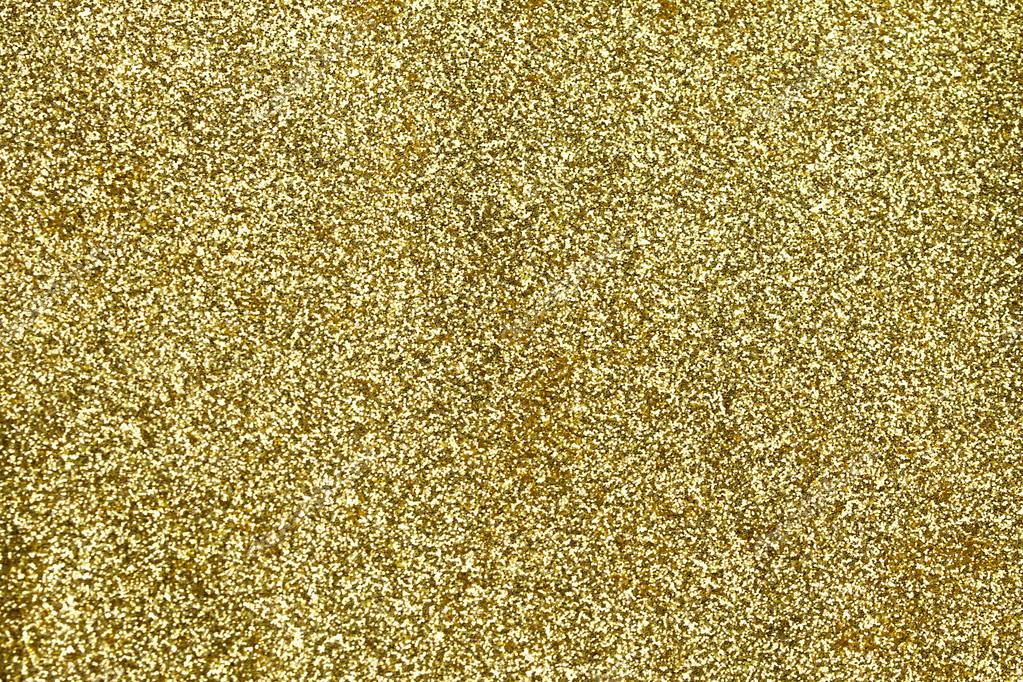 Shining gold glitter detailed texture for background (Selective focus ...