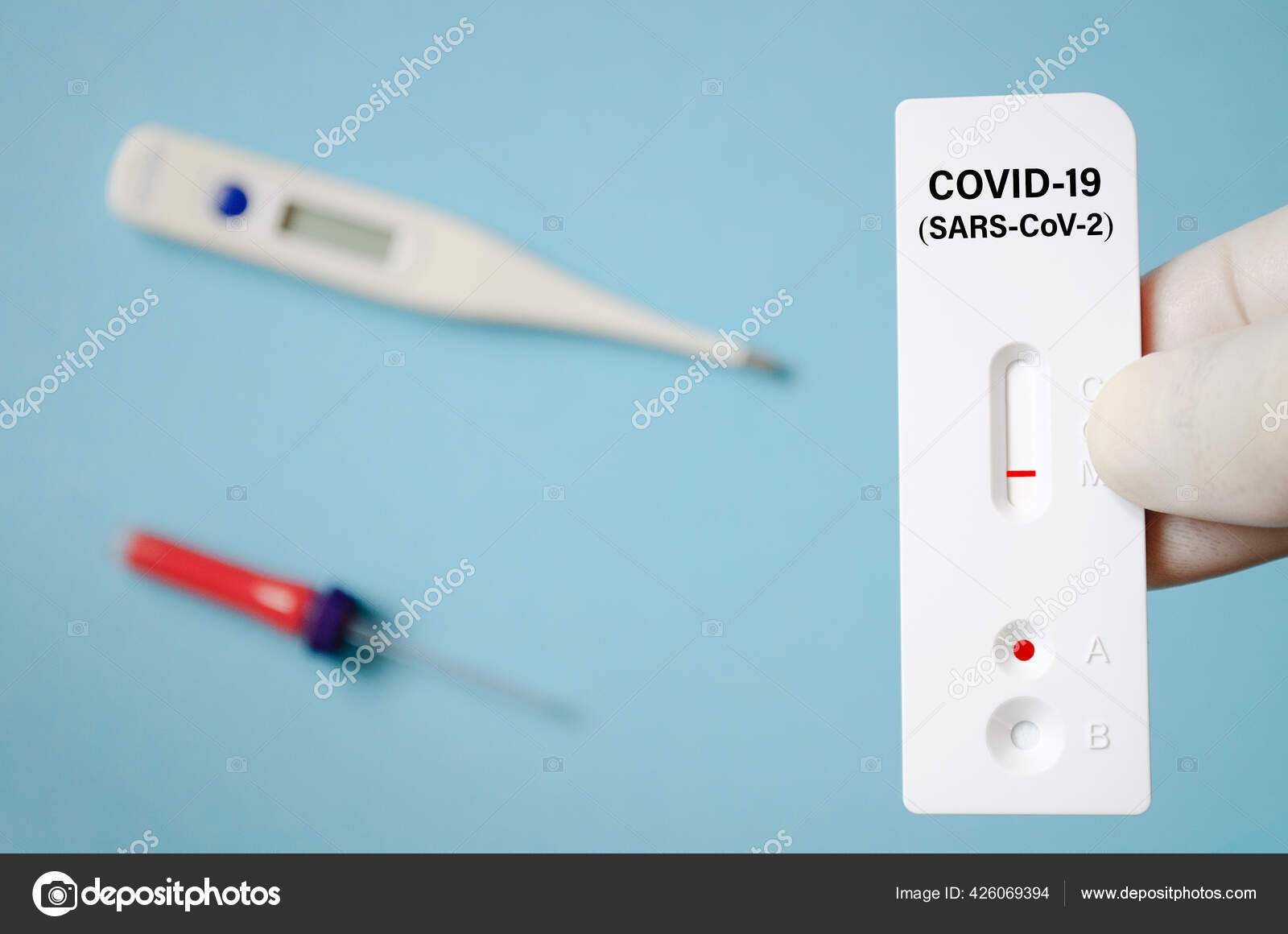 Positive test result by using rapid test for COVID-19, quick fast ...