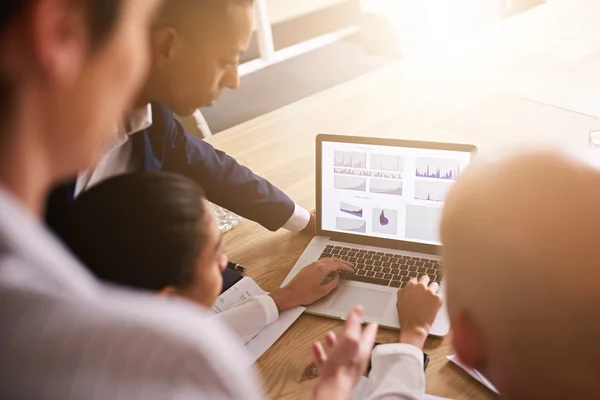 People analyzing graphs and charts - Stock Image - Everypixel