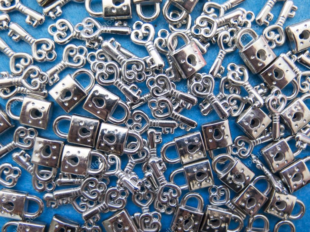 Lots of little lock-and-key on a blue background ⬇ Stock Photo, Image ...