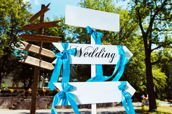 Wedding decor. Wooden plaque with the inscription Wedding. Wedding on a ...