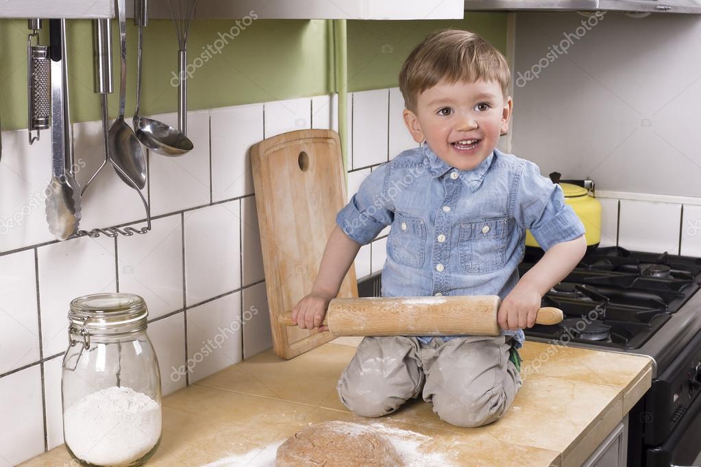 Cute little boy making pizza Stock Photo by ©red_pepper82 67658309