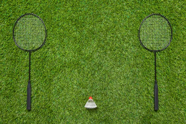 Two badminton rackets lying crossed on the grass ⬇ Stock Photo, Image ...