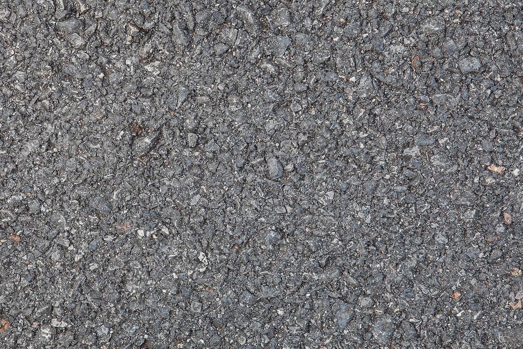 A perspective background texture of rough asphalt — Stock Photo ...