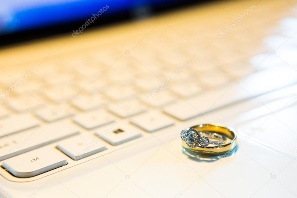 Wedding rings on a computer — Stock Photo © subinpumsom #94416162