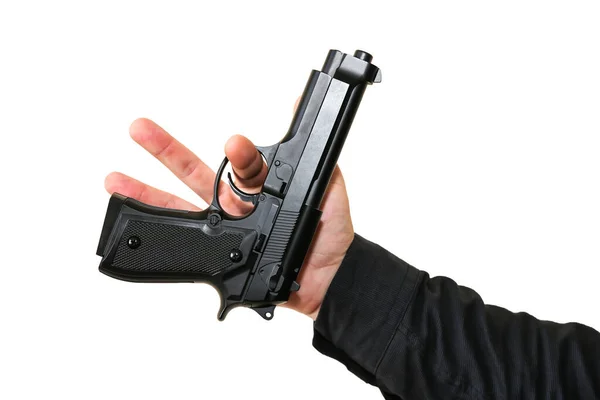 Hand Holding Gun Down