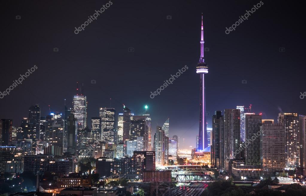 Night in Toronto. Long exposure of urban lighted skyline on a hot humid ...