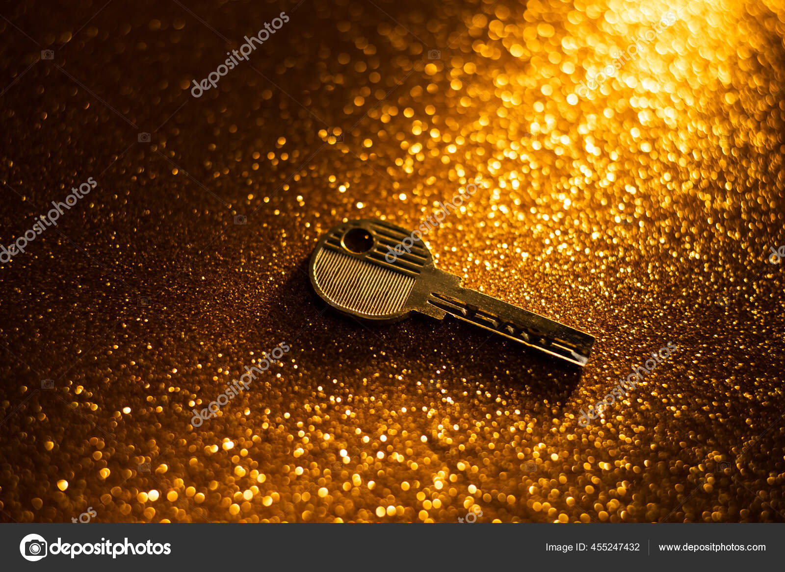 Key on gold background Stock Photo by ©shevtsovy 455247432