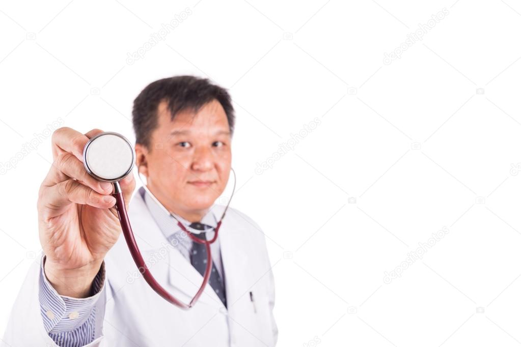 Selective focus on stethoscope held by Asian male medical doctor ...