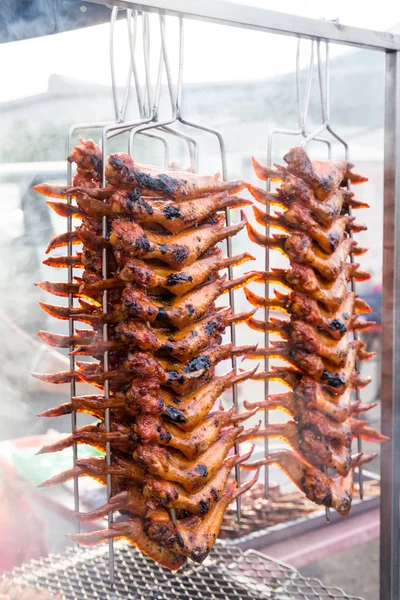 Stack of barbecue chicken wings at food bazaar hawker - Stock Image ...