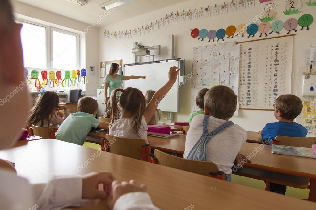 Lesson in primary school classroom — Stock Photo © vizualni #78619088