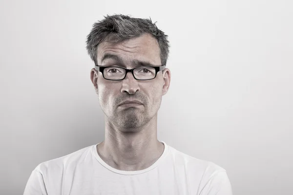 Slightly annoyed man Stock Photo by ©vizualni 79961660