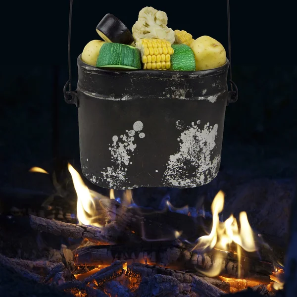 cooking on fire in the background - Stock Image - Everypixel