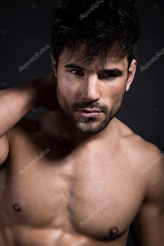 Handsome muscular man Stock Photo by ©sorali 65610005