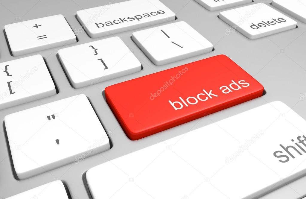 Ad blocking key on a computer keyboard for stopping internet banner ads and annoying ...