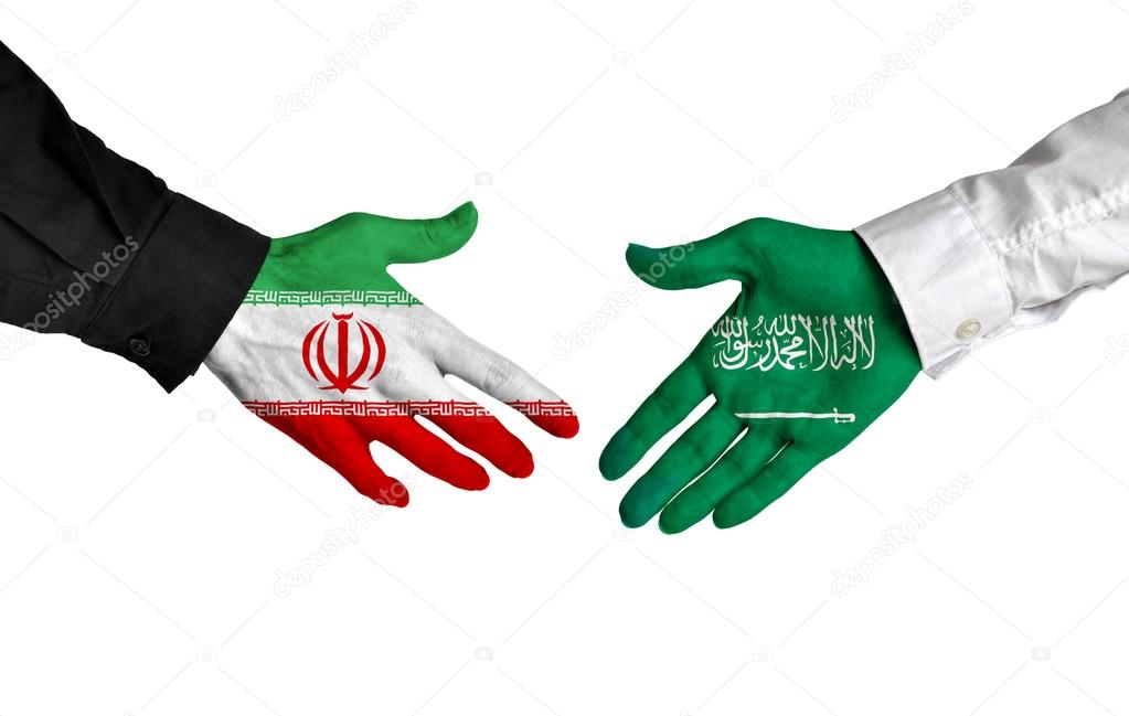 Iran and Saudi Arabia leaders shaking hands on a deal agreement — Stock ...