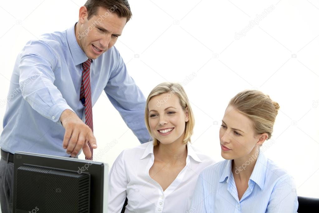 Computer training session for beautiful young women at workplace ...