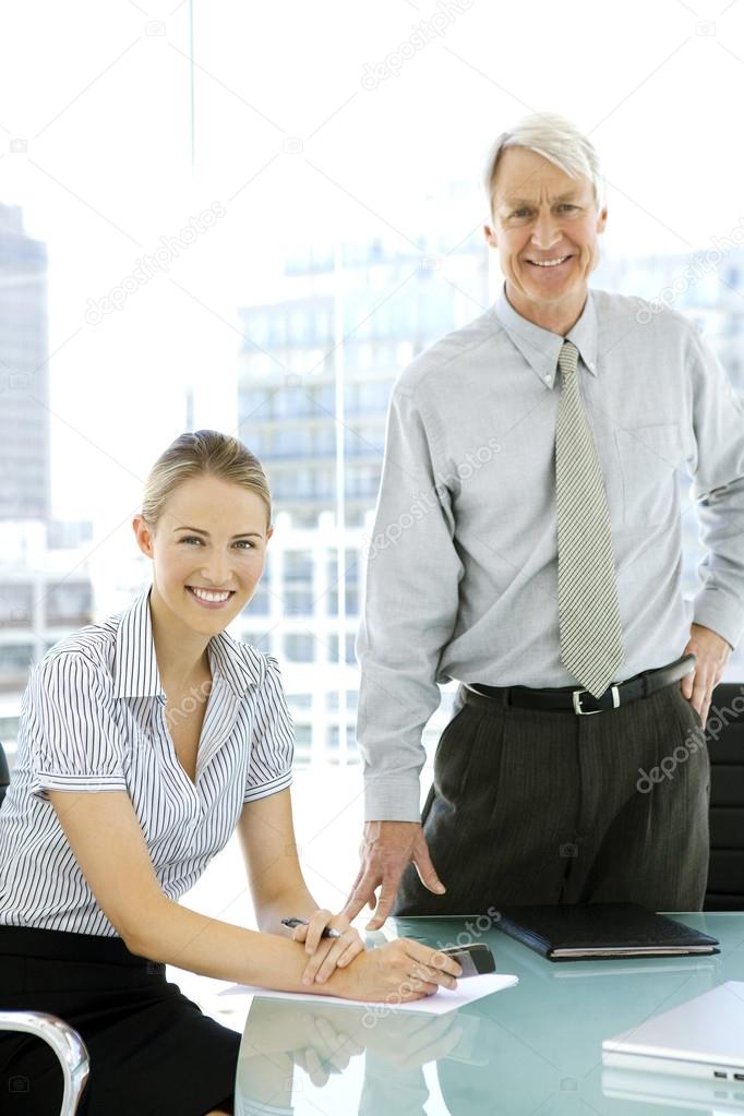 CEO with beautiful assistant — Stock Photo © depostock #65747245