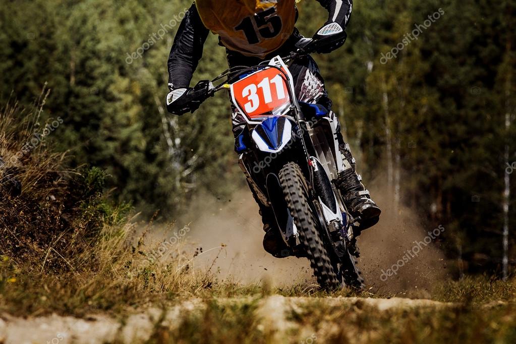Male racer on racing motorcycle — Stock Photo © chelsdo #121331250