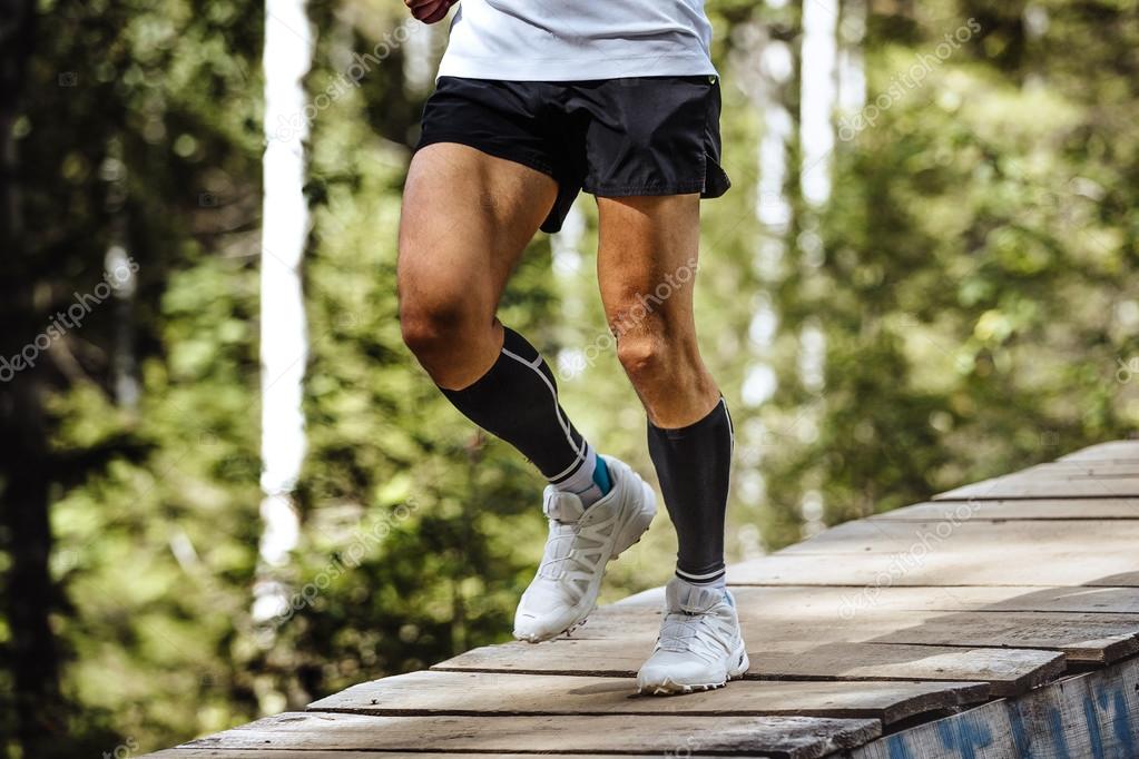 Marathon runner running in forest Stock Photo by ©sportpoint 122731194