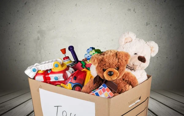 toys collection in box - Stock Image - Everypixel