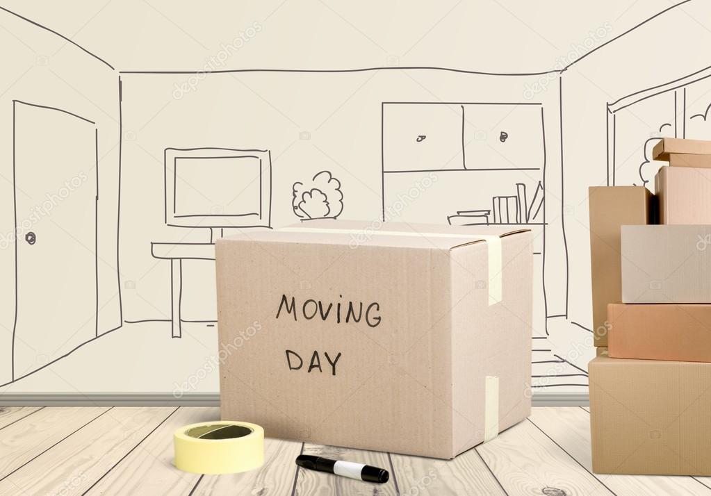 Cardboard Box labelled moving day Stock Photo by ©billiondigital 114217638