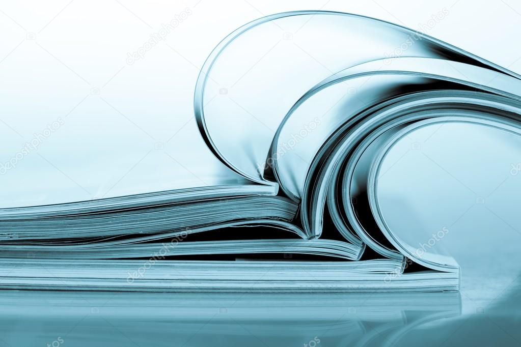 Pile of Open magazines Stock Photo by ©billiondigital 114719842