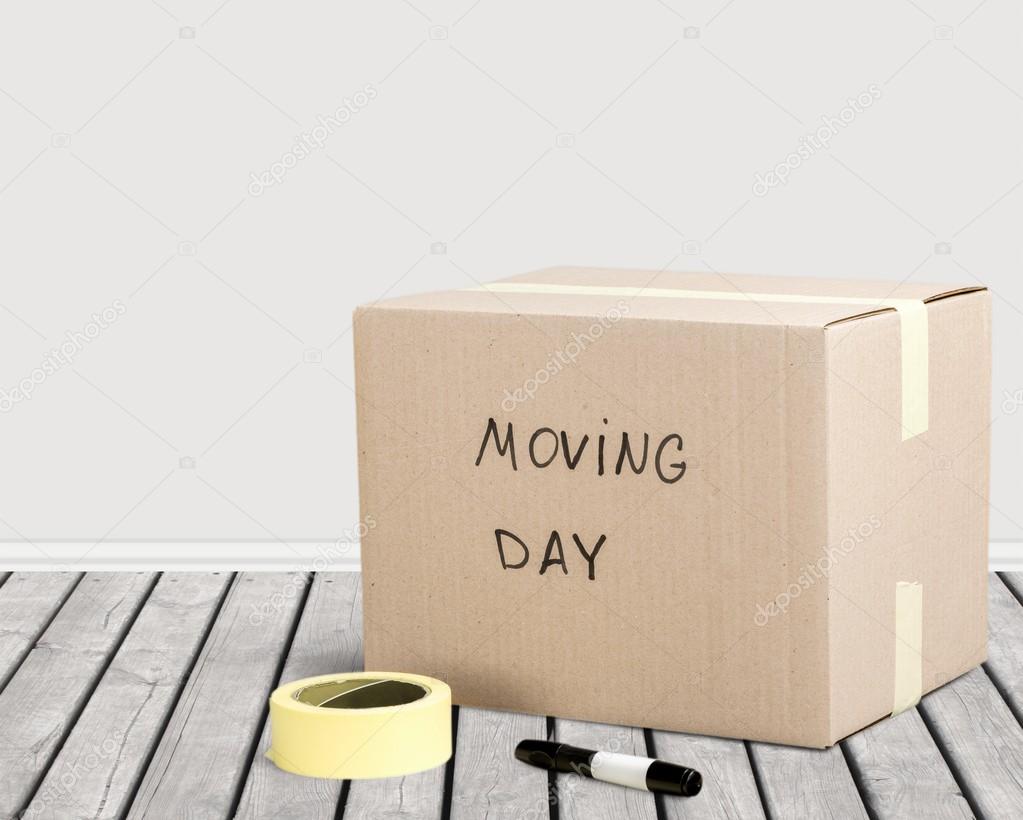 Cardboard Box labelled moving day Stock Photo by ©billiondigital 114720106