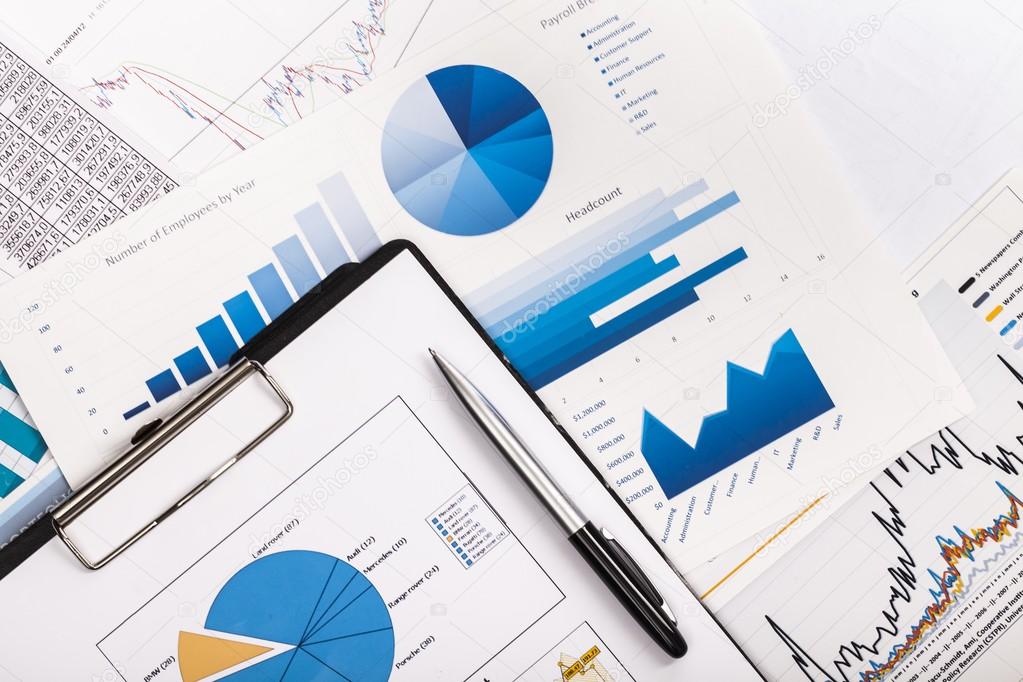 Office desk and financial documents Stock Photo by ©billiondigital ...