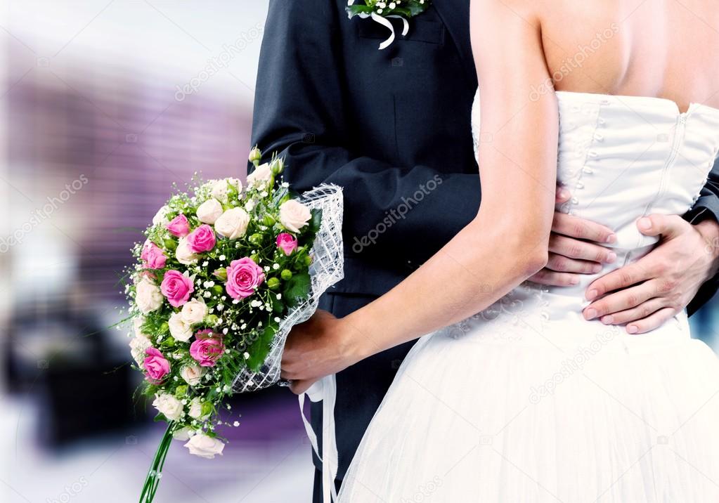 Bride and groom hugging Stock Photo by ©billiondigital 118551366