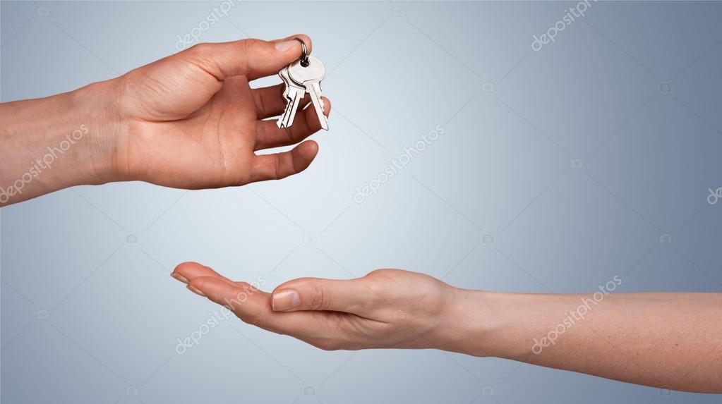 Agent giving Key to client — Stock Photo © billiondigital #118617670