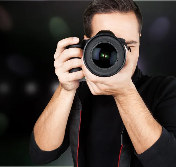 Man with photo camera — Stock Photo © librakv #12720615