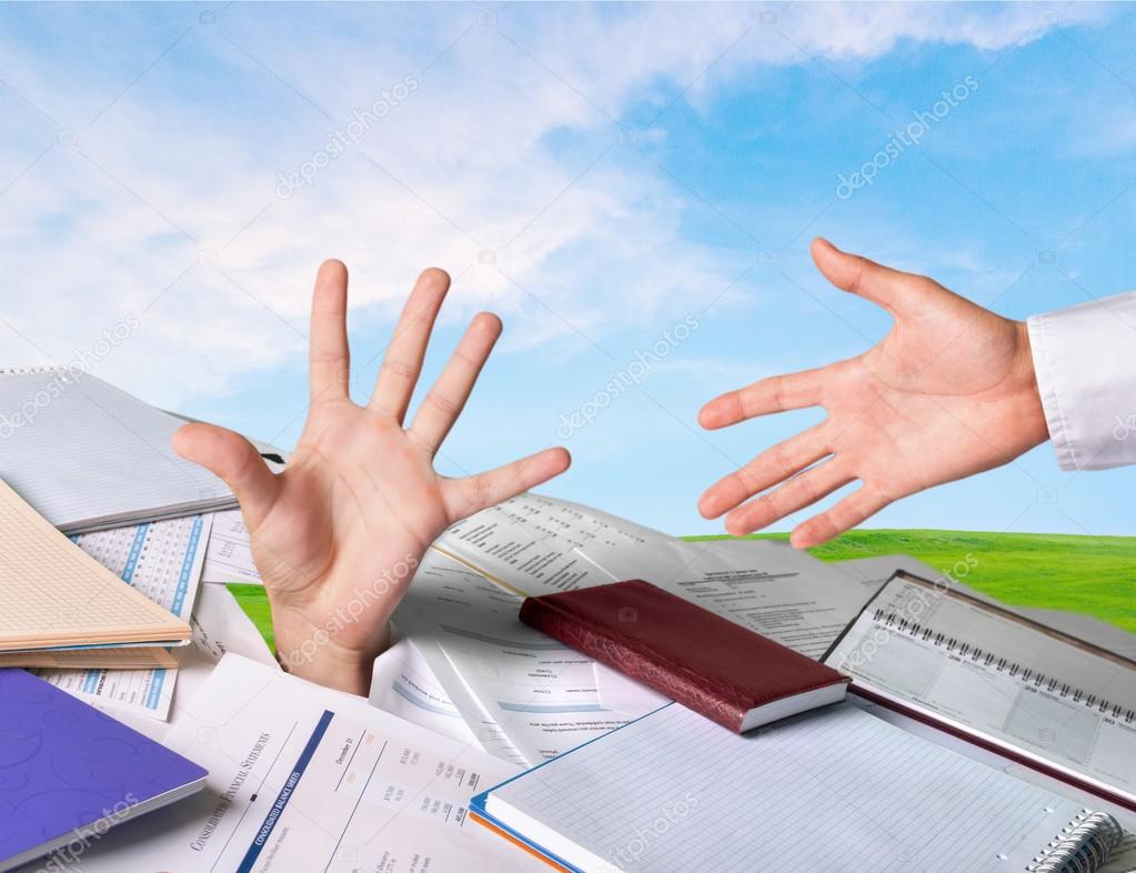 Businesswoman hand in stack of papers Stock Photo by ©billiondigital ...