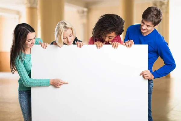 Teens llooking at posters Stock Photos, Royalty Free Teens llooking at ...