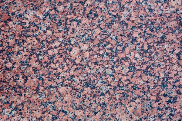 Stone Background of mottled red granite igneous rock Stock Photo by ...